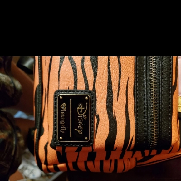 Loungefly | Bags | Tigger Loungefly Backpack Original Loungefly Logo ...
